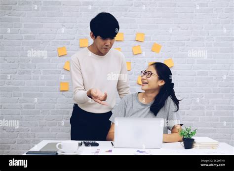 Man Woman Colleagues Discussing Ideas On Computer Startup Teamwork Coworking Team Working At