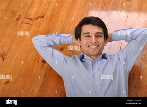 Man Lying On The Floor Stock Photo Alamy