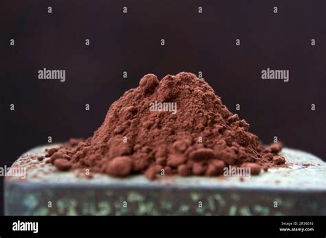 Cocoa Powder On An Antique Cocoa Tin Stock Photo Alamy