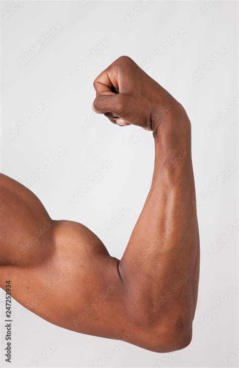 Strong Black Man Flexing Muscles Stock Photo Adobe Stock