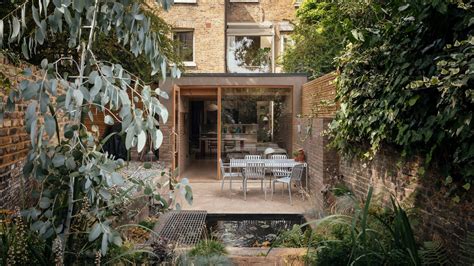 Nimtim Architects Creates London Home Extension With Walled Garden