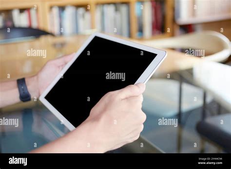 Man Holding An IPad Stock Photo Alamy