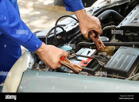 Man Testing Modern Car Battery Stock Photo Alamy