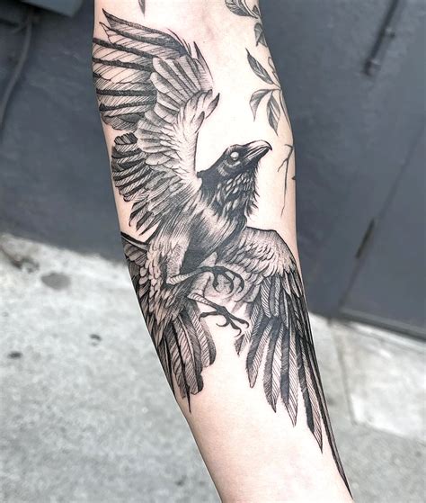 16 Bold And Artistic Raven Tattoo Ideas Youll Love