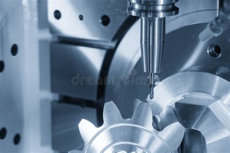 The 5 Axis Cnc Milling Machine Cutting The Automotive Part With Solid Ball End Mill Tool Stock