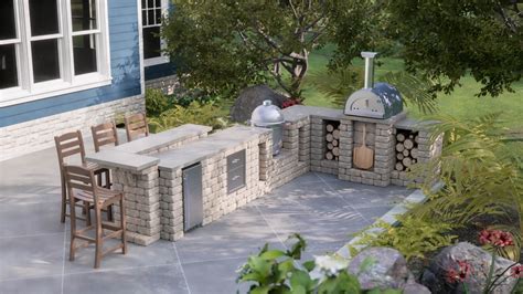 L Shaped Outdoor Kitchen With Kamado Pizza Oven And Bar