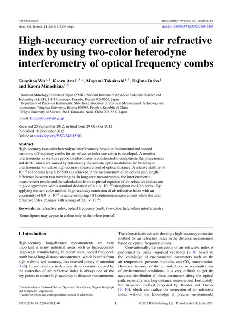 High Accuracy Correction Of Air Refractive Index By Using Two Color Heterodyne Interferometry Of