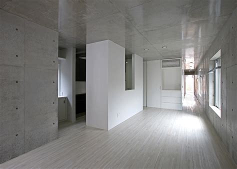 Concrete Homes Patterned With Formwork Holes By Atelier Hako