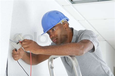 Man Installing Wiring Stock Image Colourbox