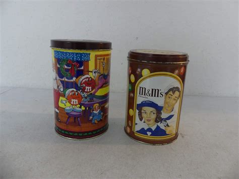 Lot 163 Vintage Mandms Tins 1991 50th Anniversary And 1994 Holiday Hidden Treasure Estate