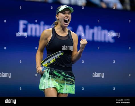 Caroline Wozniacki Of Denmark In Action During Her Second Round Match