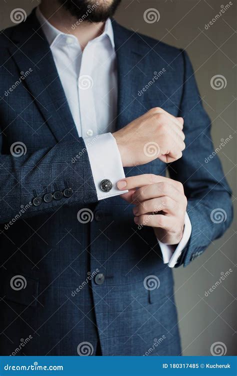 Close Up Of A Man In A Tux Fixing His Cufflink Stock Image Image Of Fixing Cravat