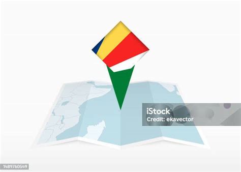 세이셸은 접힌 종이지도와 세이셸 국기로 고정 된 위치 마커에 묘사되어 있습니다 0명에 대한 스톡 벡터 아트 및 기타 이미지 0명 기 도시 Istock