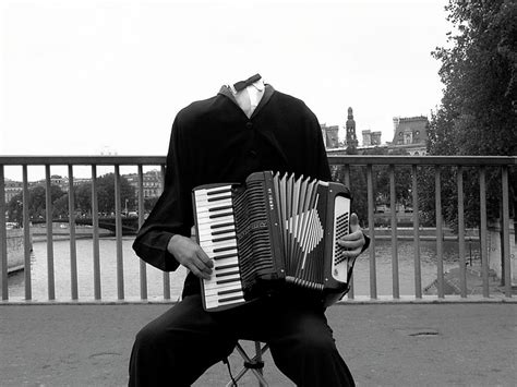 Paris Headless Accordion Player On Seine Bridge Photograph By L Michael