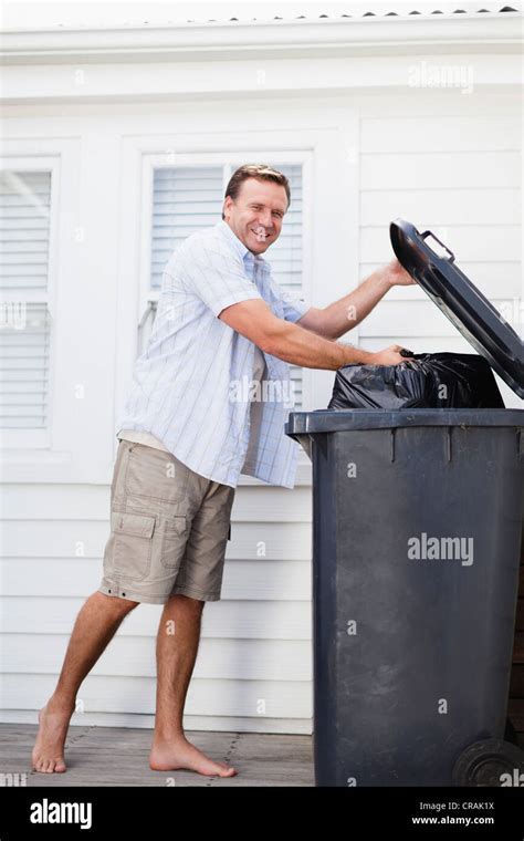 Man Taking Out The Trash