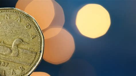 Loonie Hits Four Month Low As Bank Of Canada Holds Key Interest Rate Business In Vancouver