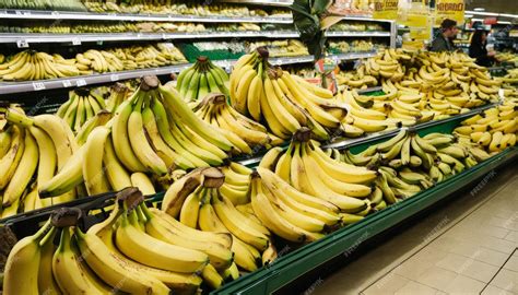 Premium Photo A Large Display Of Bananas In A Grocery Store