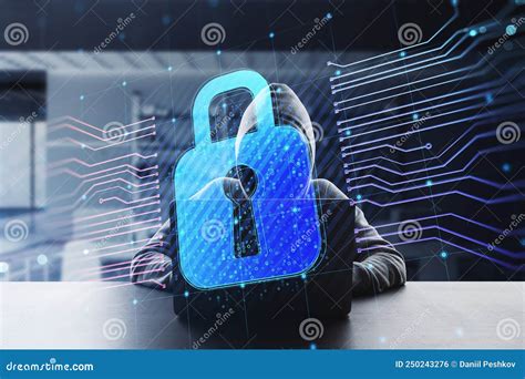front view of hacker at desktop using laptop with glowing padlock