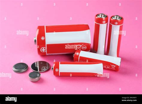 Different Types Of Batteries On Pink Background Stock Photo Alamy