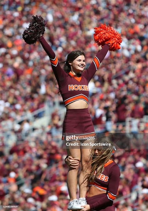 Virginia Tech Hokies Cheerleader Performing During A College Football