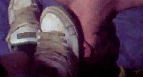 Skater Grinding Sneaker Treads Into Slaves Face Burning