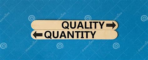 Quantity Or Quality Symbol Concept Word Quantity Or Quality On Beautiful Wooden Stick