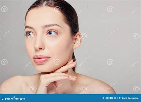 Beautiful Young Woman With Clean Fresh Skin And Dark Hear Nude Make Up