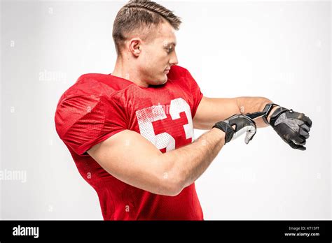 Football Player Pointing On Smartwatch Stock Photo Alamy