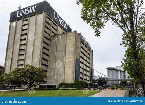 view of the tall main library building from the scientia lawn unsw