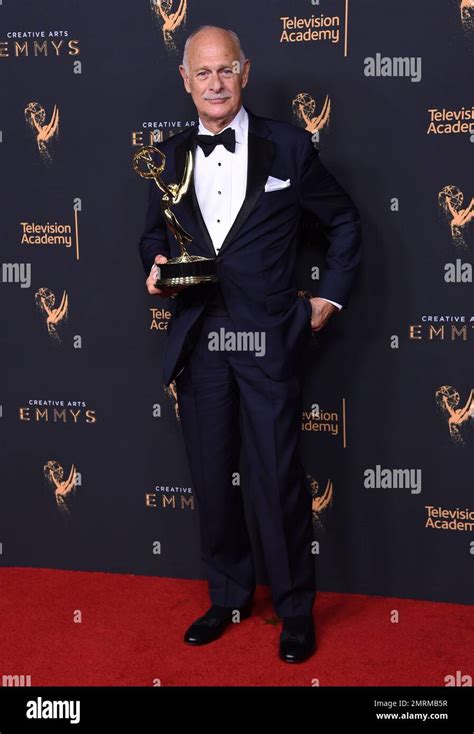 Gerald Mcraney Poses In The Press Room With The Award For Outstanding