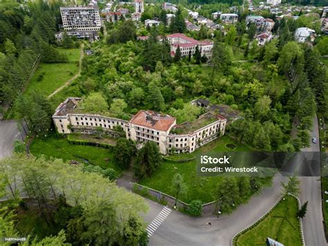 Aerial View Of A Sovietera Resort Building Surrounded By Lush Greenery