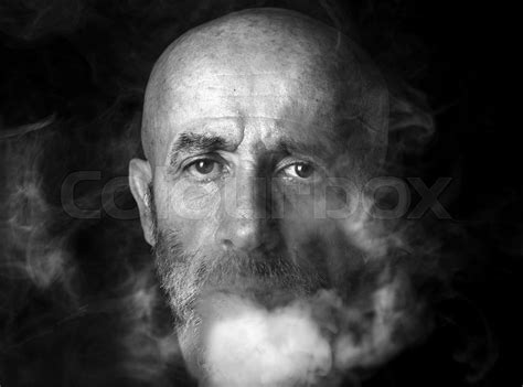 Man Blowing Smoke Stock Image Colourbox