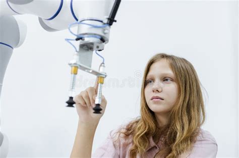 Girl Caucasian Education Electronic Robotic Arm On Table At Class Room Learning Innovation