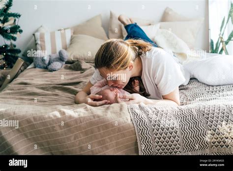 Mom With Baby On Bed Hi Res Stock Photography And Images Alamy