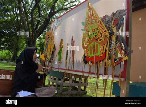 The Female Puppeteer Is Practicing Playing The Puppet Stock Photo Alamy