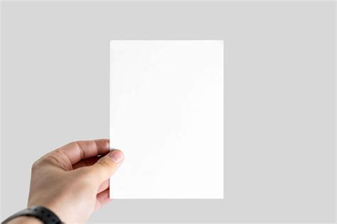 A6 Leaflet In Hand Mockup Psd