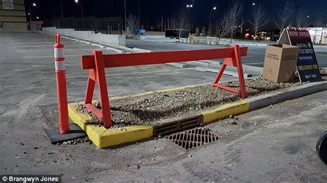 Calgary Drivers Can T Stop Crashing Into Giant Rock Daily Mail Online