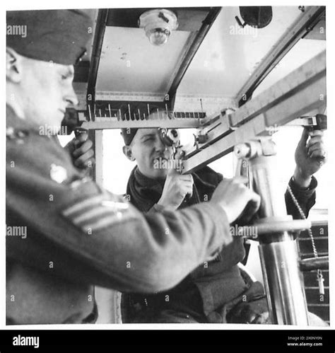 The Range Officer And Assistant Operate The Rake A Machine Calculating Shooting Errors