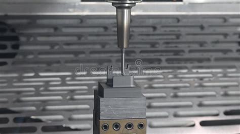 The Cnc Milling Machine Cutting The Graphite Electrode Parts Stock