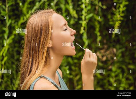 Woman Doing DNA Test With Cotton Swab Test For Home Use Stock Photo Alamy