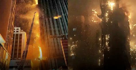 香港一在建大楼发生严重火灾：火焰贯穿整栋楼体 火星余烬不断飘落 腾讯新闻