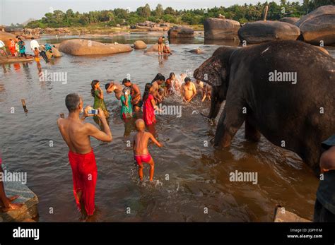 Indian People Bathing Tungabhadra River Hi Res Stock Photography And