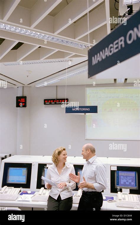 Business People Data Center Control Center Man Woman License Free Except Ads And Billboards