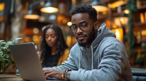 A Vibrant Image Showing Young Coders And Developers Working Diligently Premium Ai Generated Image