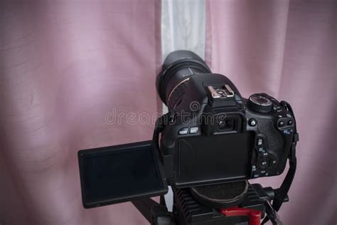 Digital Video Camera Hidden Behind Pink Curtains Spying Neighbors