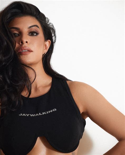 Jacqueline Fernandez In Tiny Black Top And Low Waist Jeans With Belly
