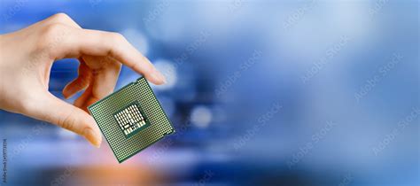 microchip of a new generation processor in a woman s hand stock