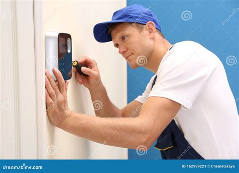 Male Technician Installing Security Alarm System Stock Image Image Of Code Alarm