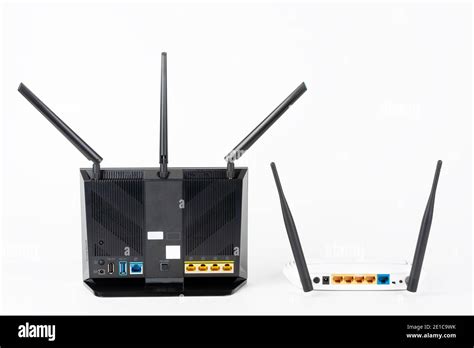 rear view of two wi fi routers wireless devices with two and three