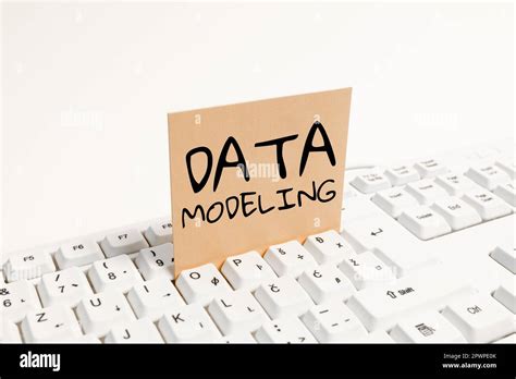 Sign Displaying Data Modeling Word For Process Of Transferring Data Between Data Storage